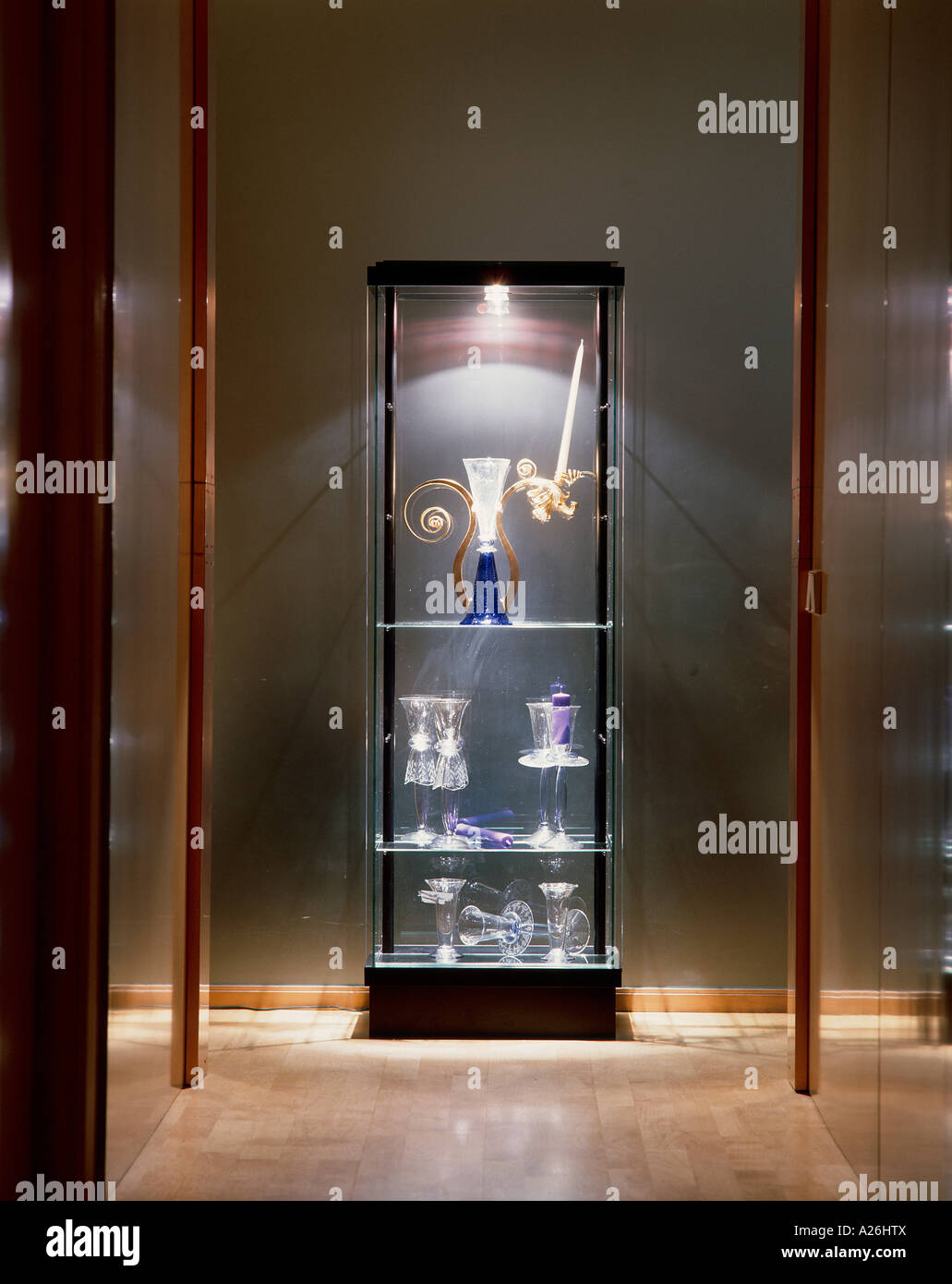 View of a showcase containing glassware Stock Photo - Alamy