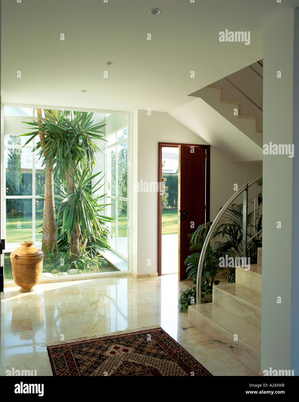 View of an open door at the entrance of a house Stock Photo - Alamy