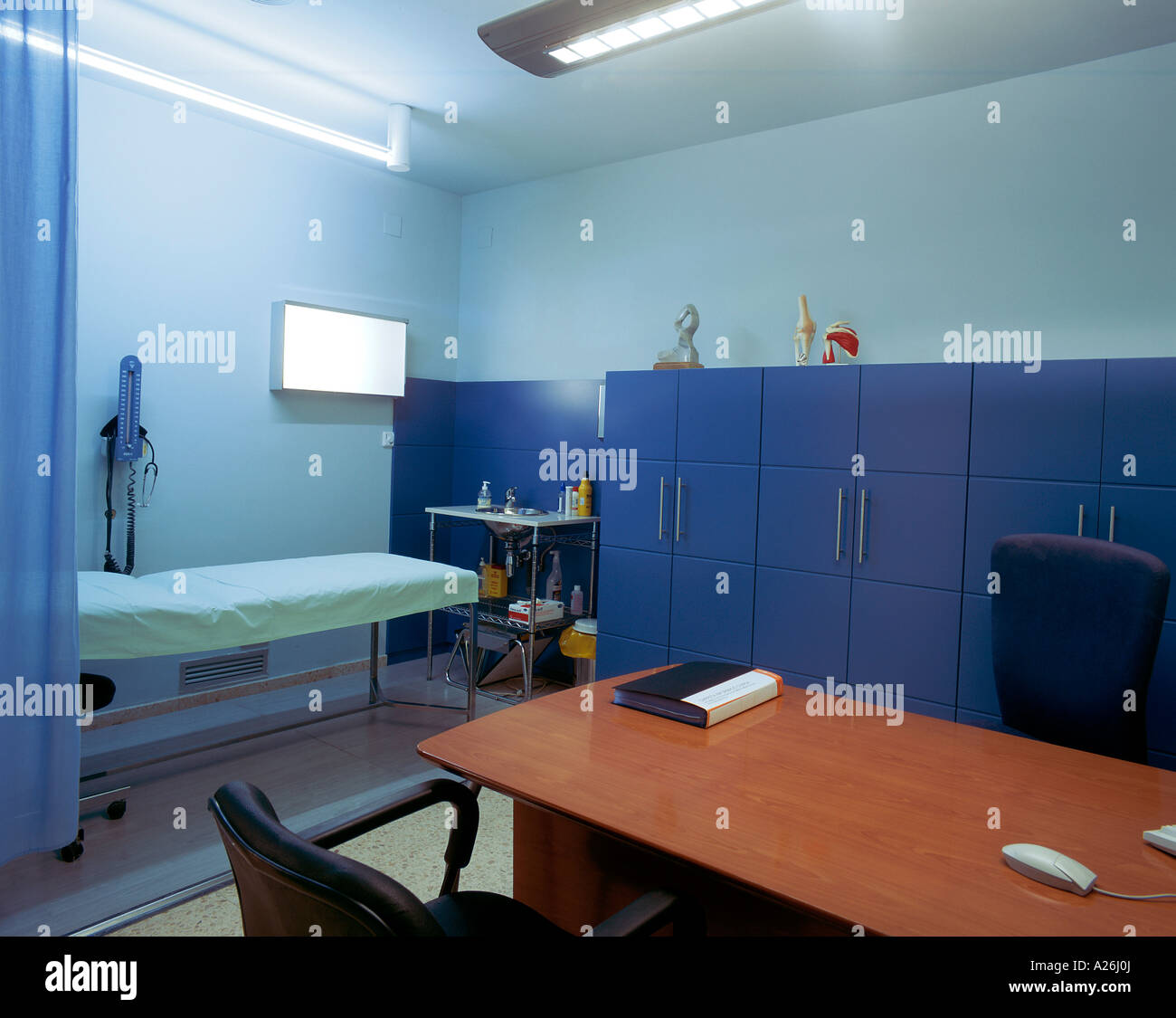 Partial view of a table and chairs in a clinic Stock Photo - Alamy