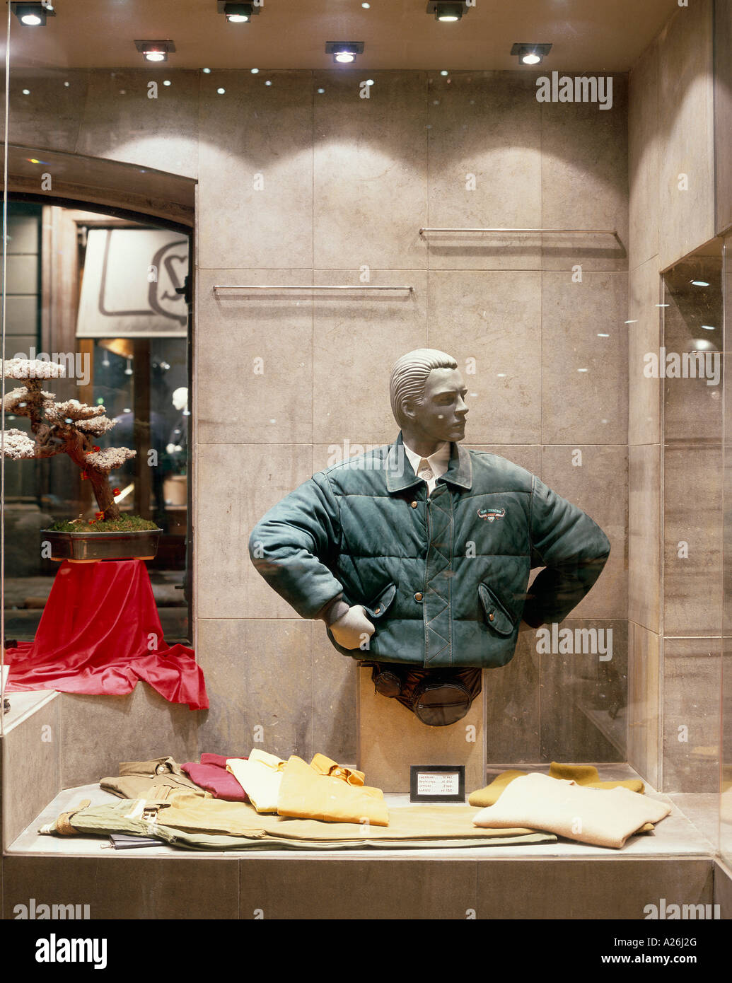View of a displayed mannequin seen thru a window Stock Photo - Alamy