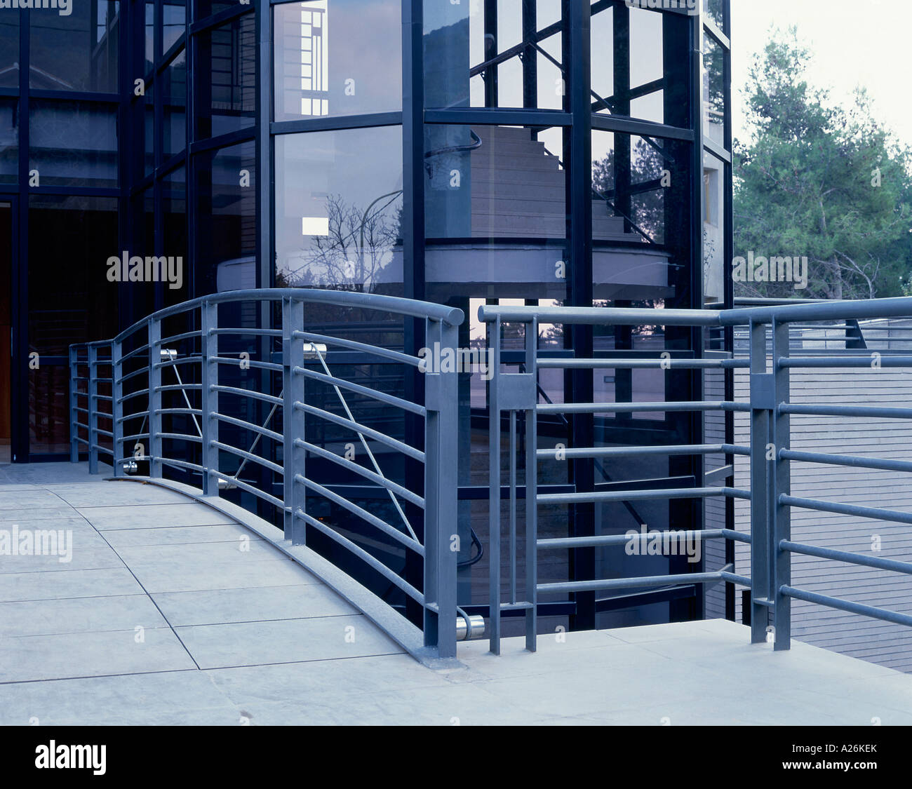 View of a bridge leading to an office building Stock Photo - Alamy