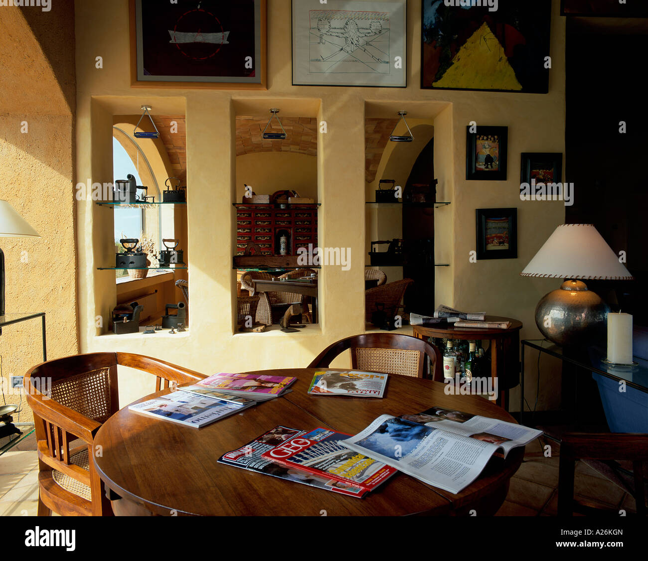 View of magazines on a wooden table Stock Photo - Alamy