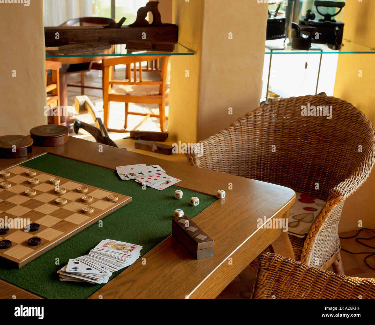 View of playing cards and board game on a table Stock Photo - Alamy