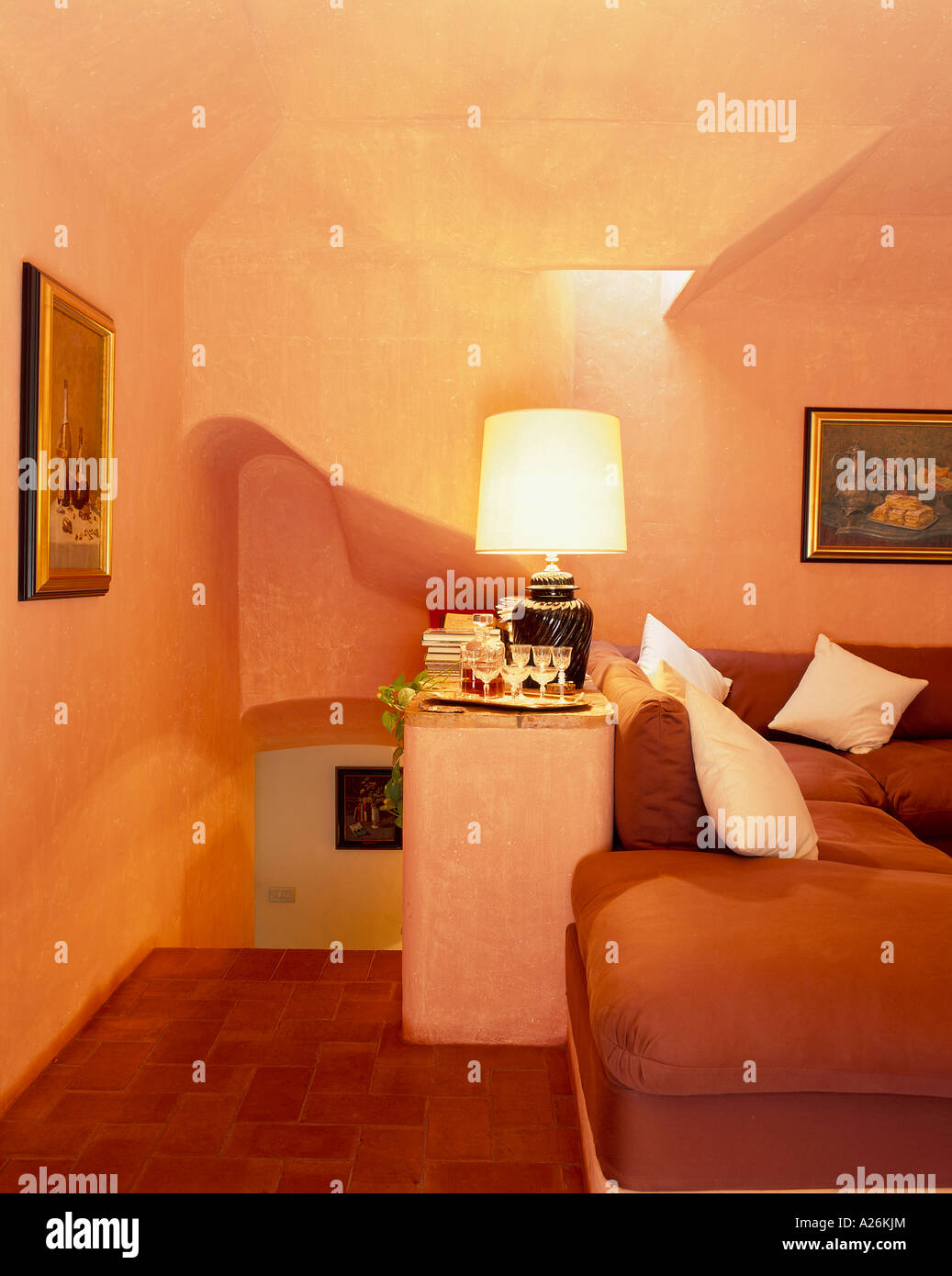 Partial view of a lit living room Stock Photo - Alamy