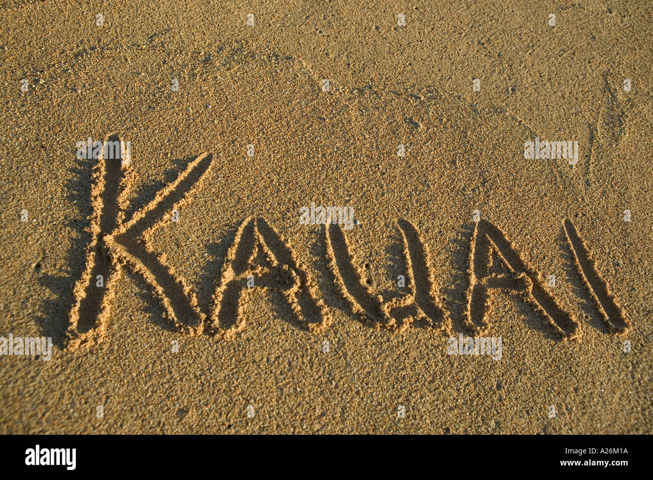 Kauai written in the sand Stock Photo - Alamy