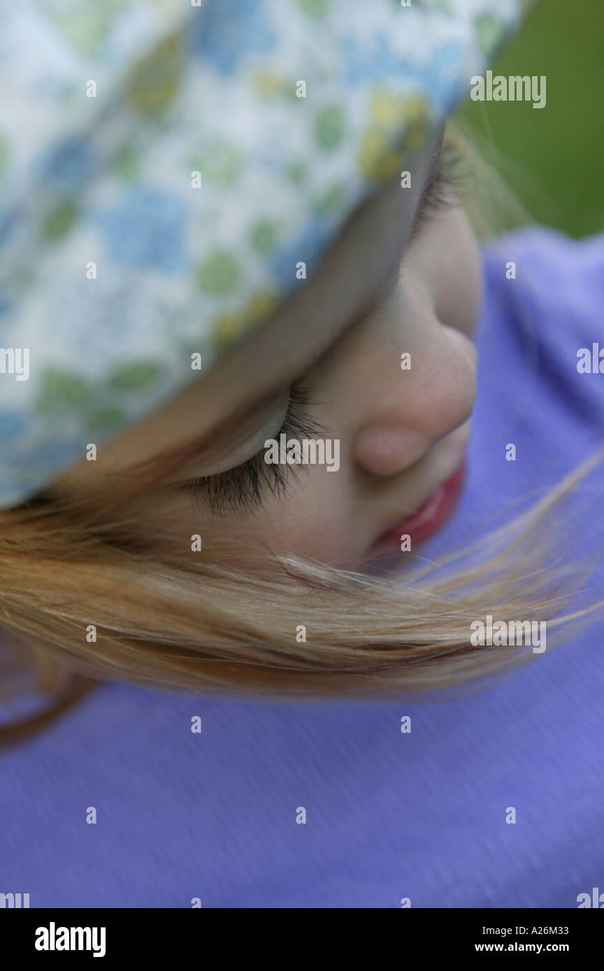 Close Up Of Child Looking Down Stock Photo - Alamy