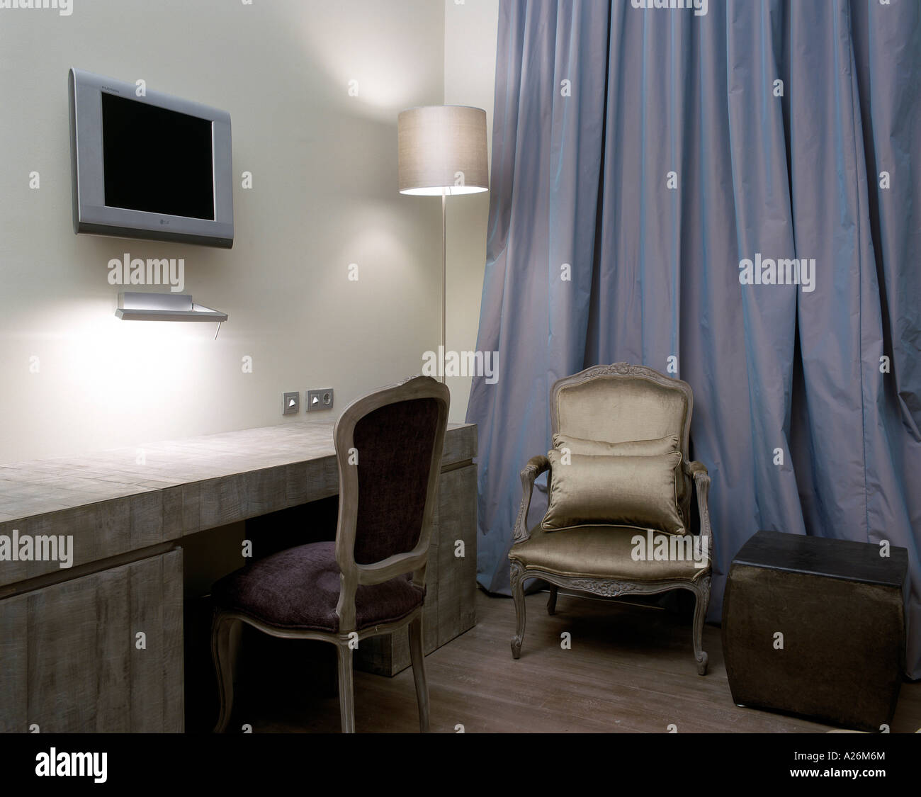 View of two chairs in a lit room Stock Photo - Alamy