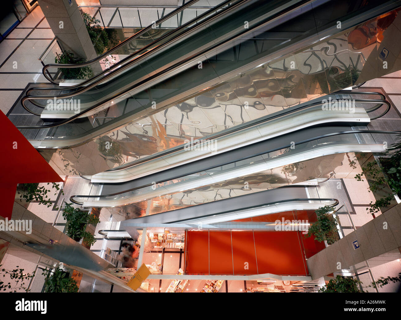 View of escalators in a grand shopping mall Stock Photo - Alamy