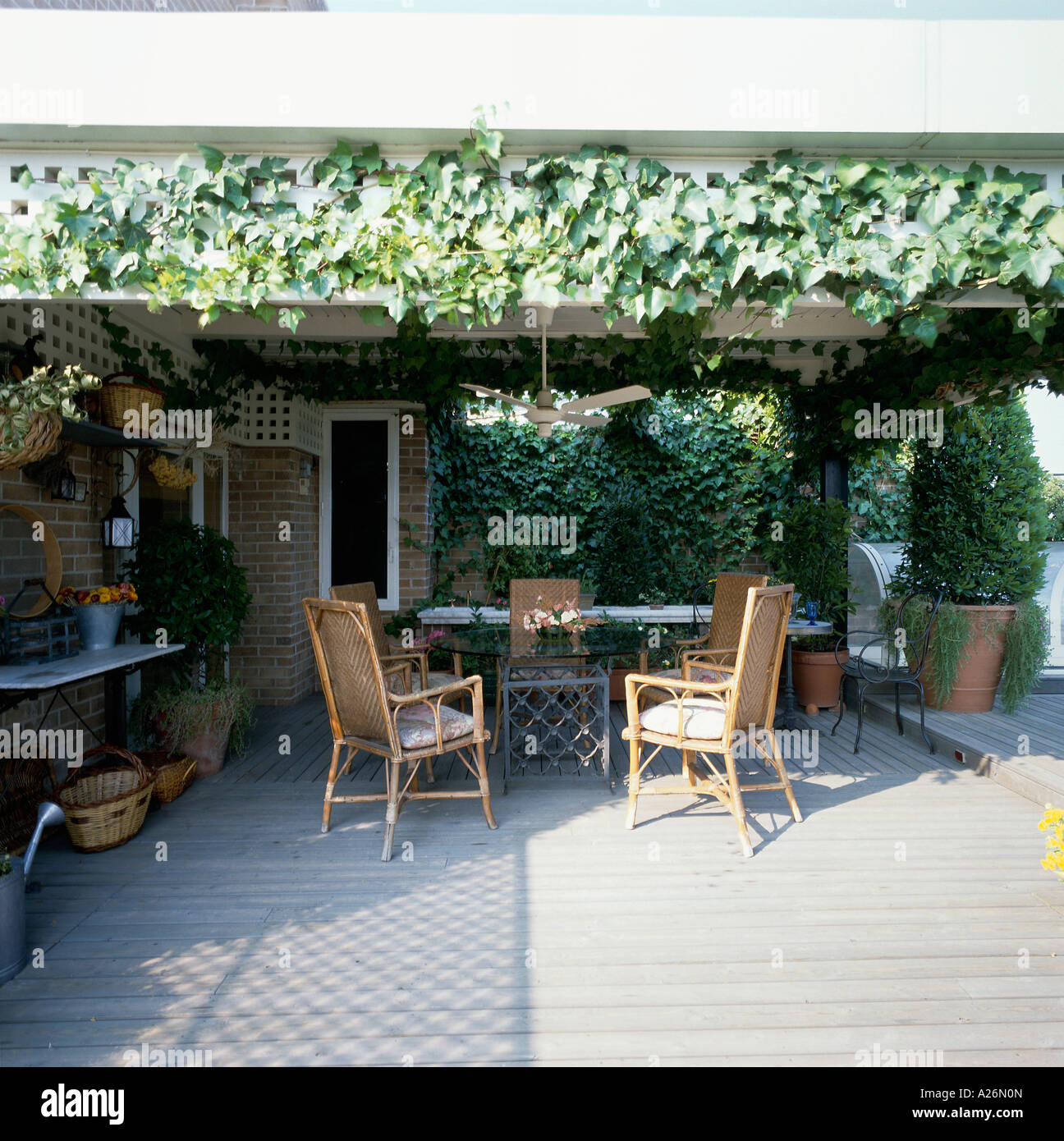 View of seating arrangement in the lanai Stock Photo - Alamy