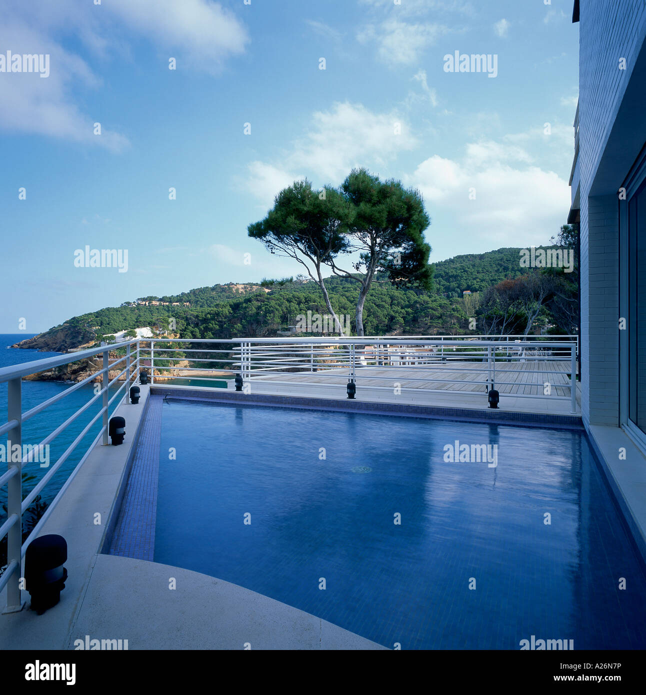 View of a swimming pool attached to a house Stock Photo - Alamy