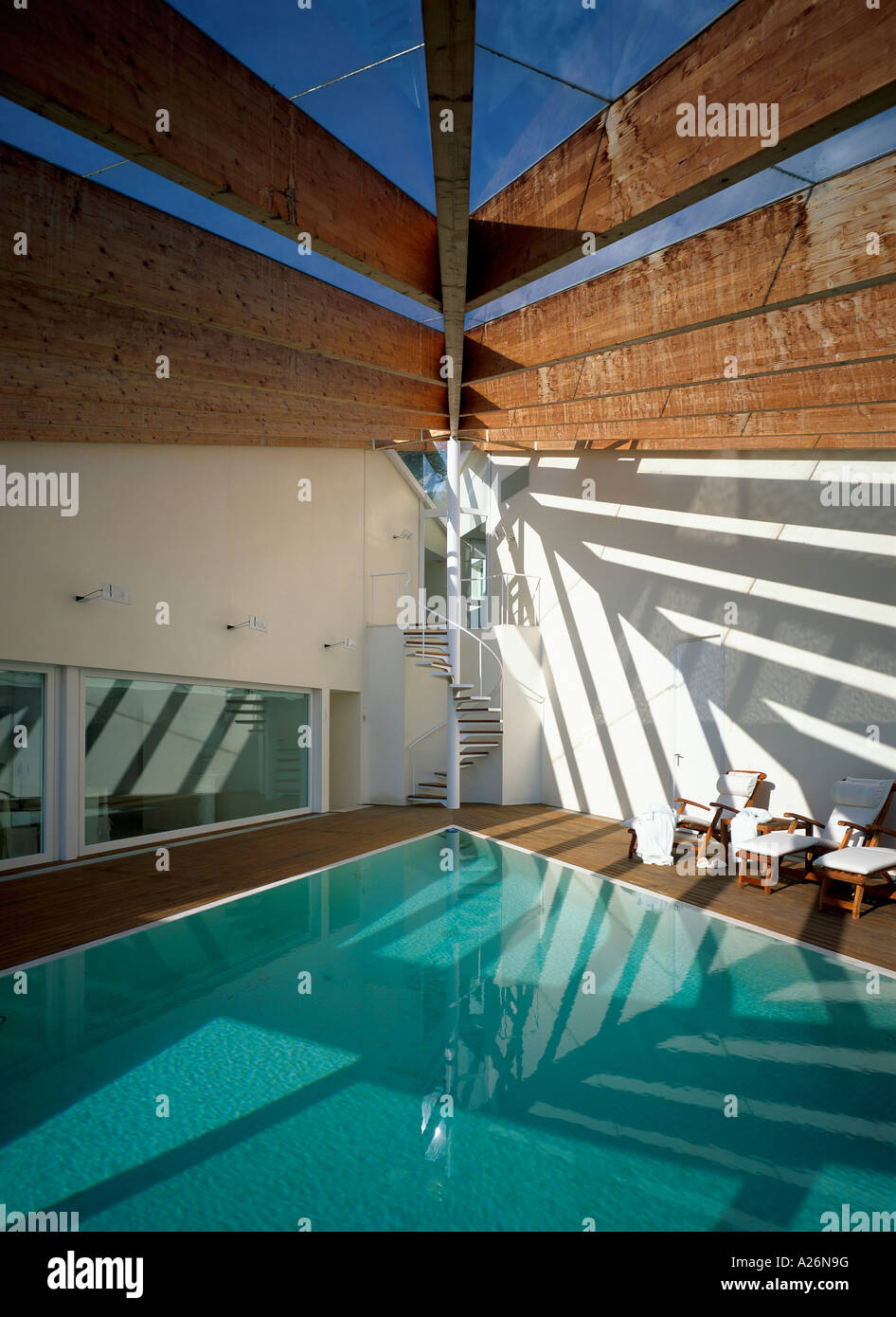 View of a clear indoor swimming pool Stock Photo - Alamy