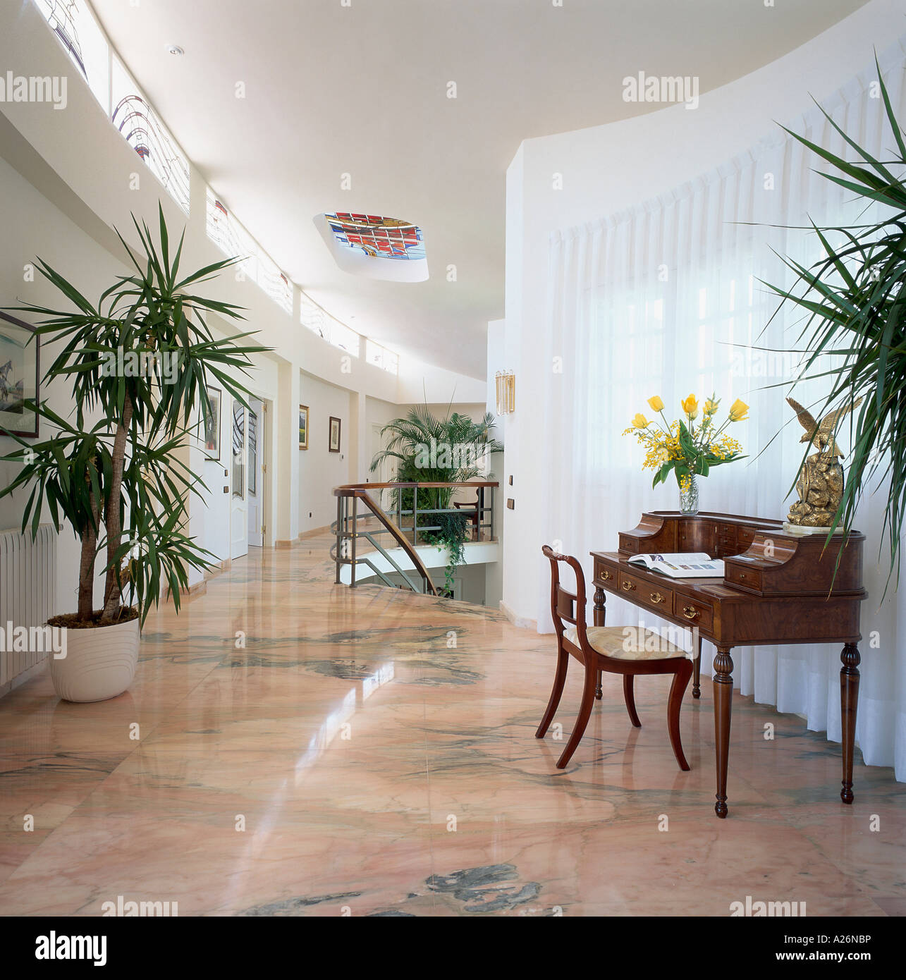 View of an antique writing table in a hallway Stock Photo - Alamy
