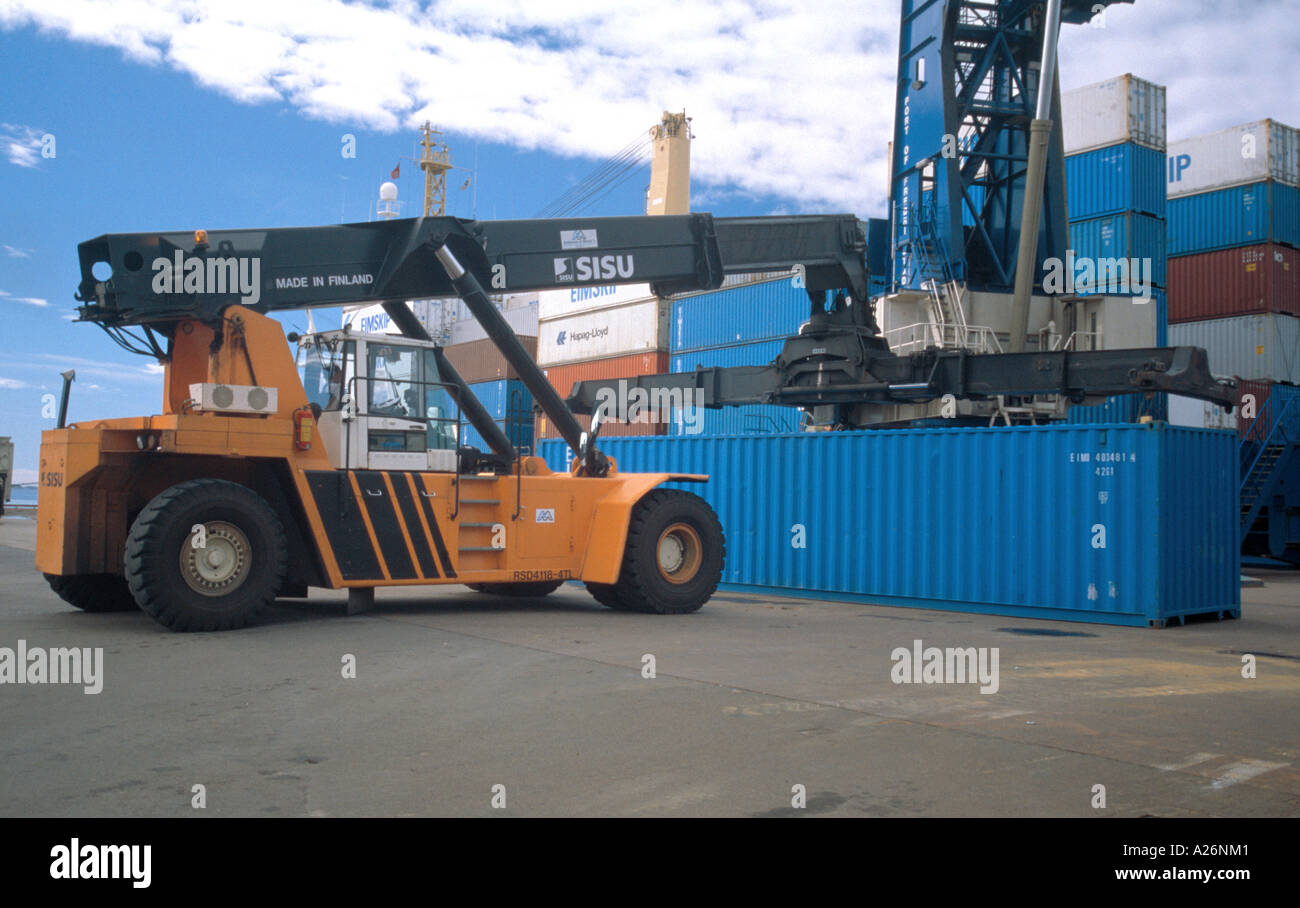 Harbour Transporter with Freight Ship Containers Stock Photo - Alamy