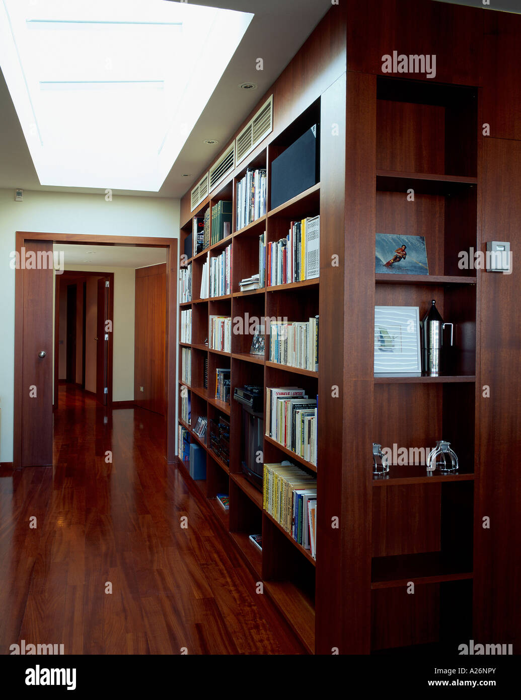 View of an elegant organized library Stock Photo - Alamy