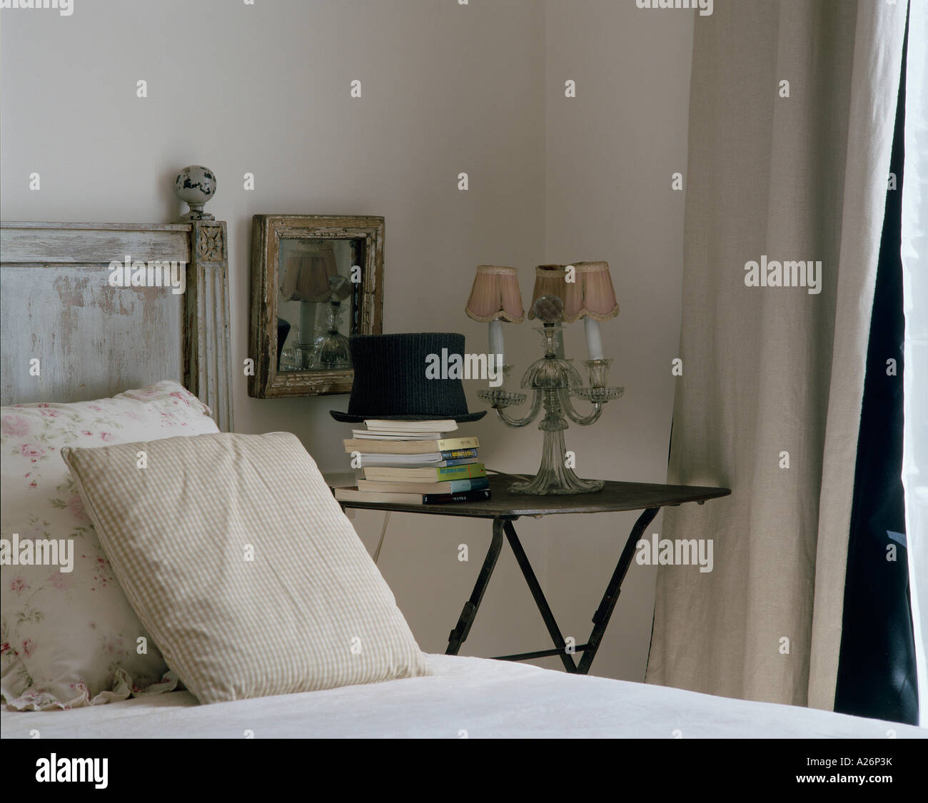 View of a nightstand beside a bed Stock Photo - Alamy