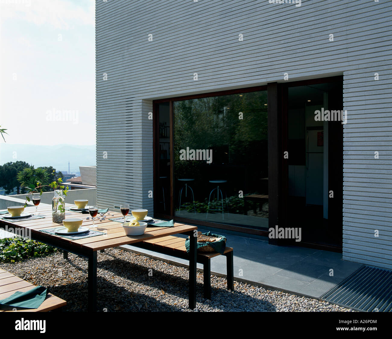 A table is set outside a house Stock Photo - Alamy