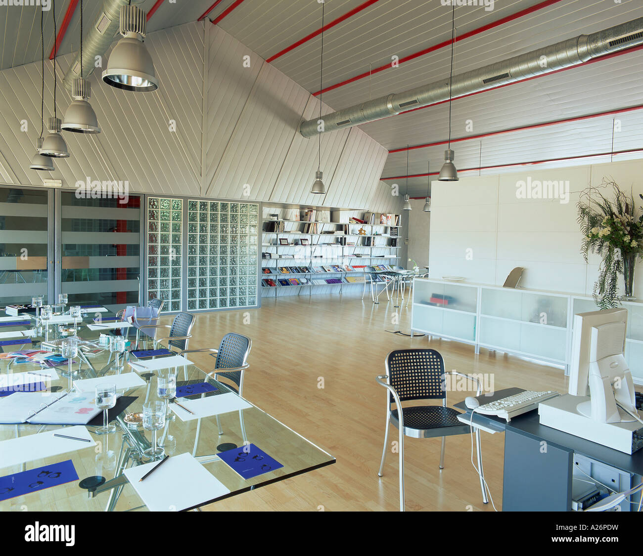 A spacious home office with a conference table is seen Stock Photo - Alamy