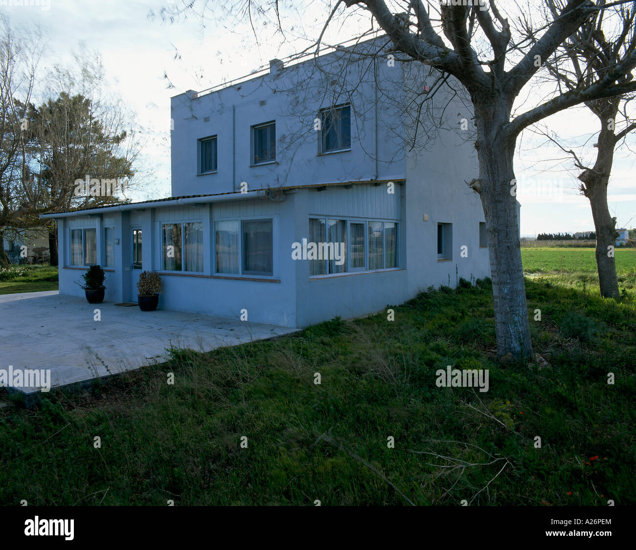 View of a house amid fields Stock Photo - Alamy