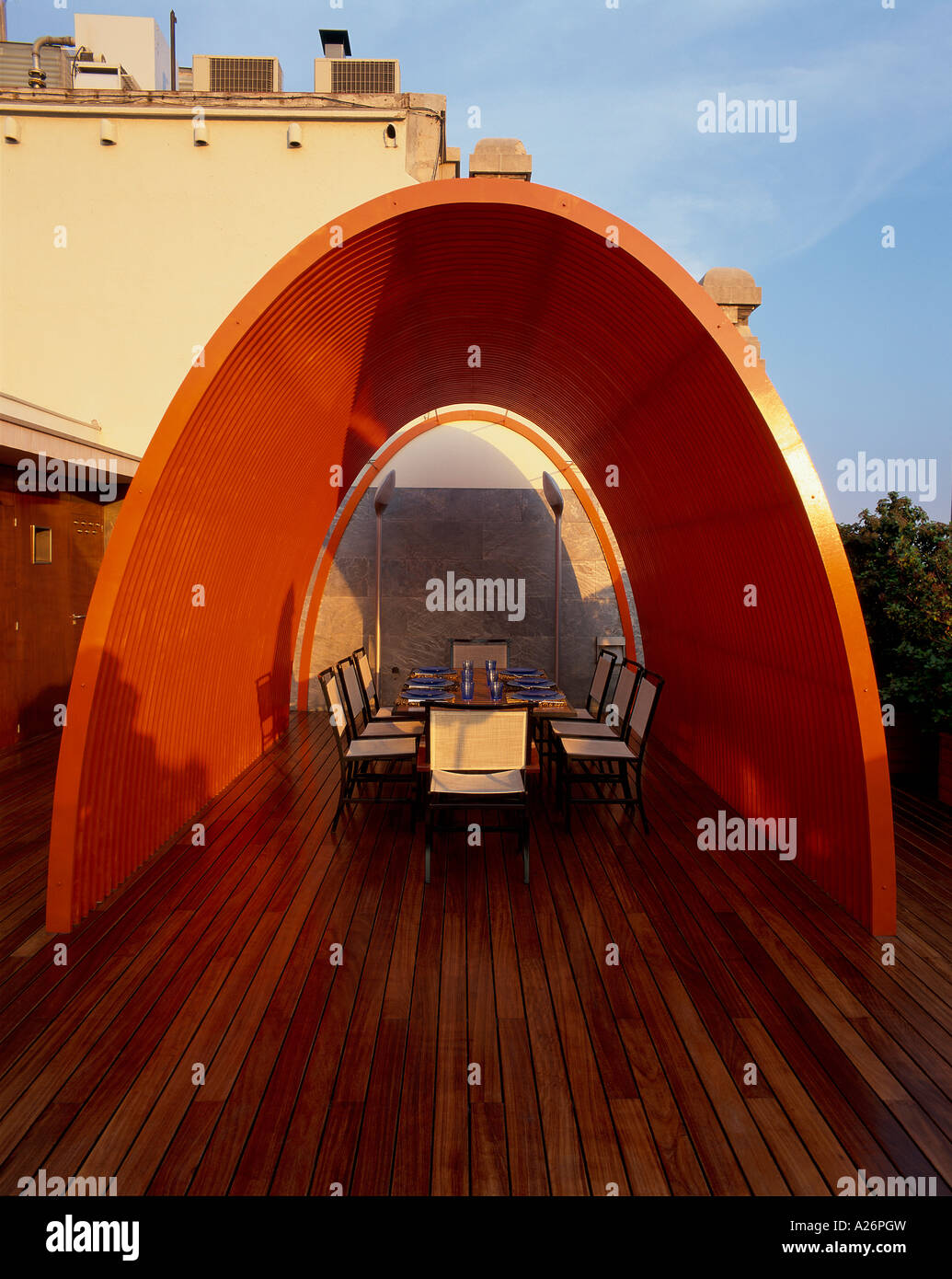 View of a dining table set under a shade Stock Photo - Alamy