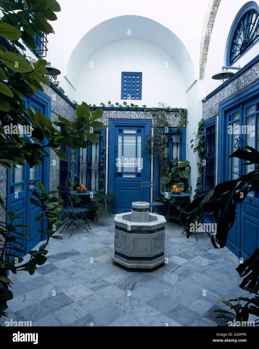 Spanish style indoor patio hi-res stock photography and images - Alamy