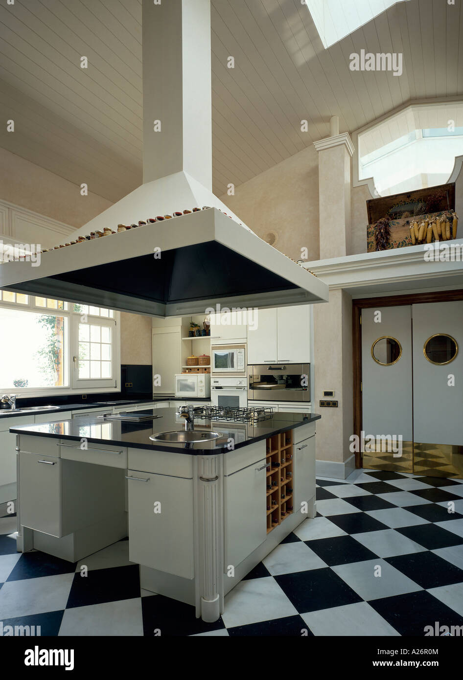 View of a large hood above a counter of a kitchen Stock Photo - Alamy