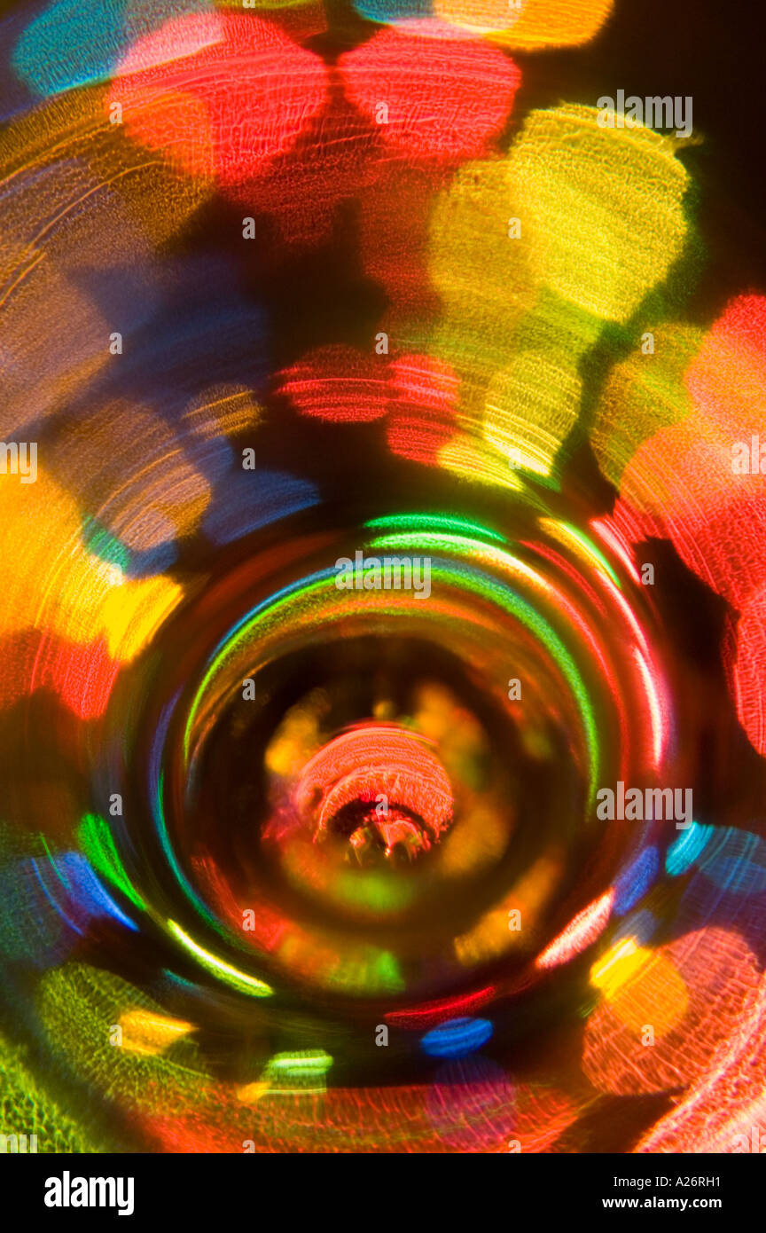 Festive Christmas lights refracted through various glass containers ...
