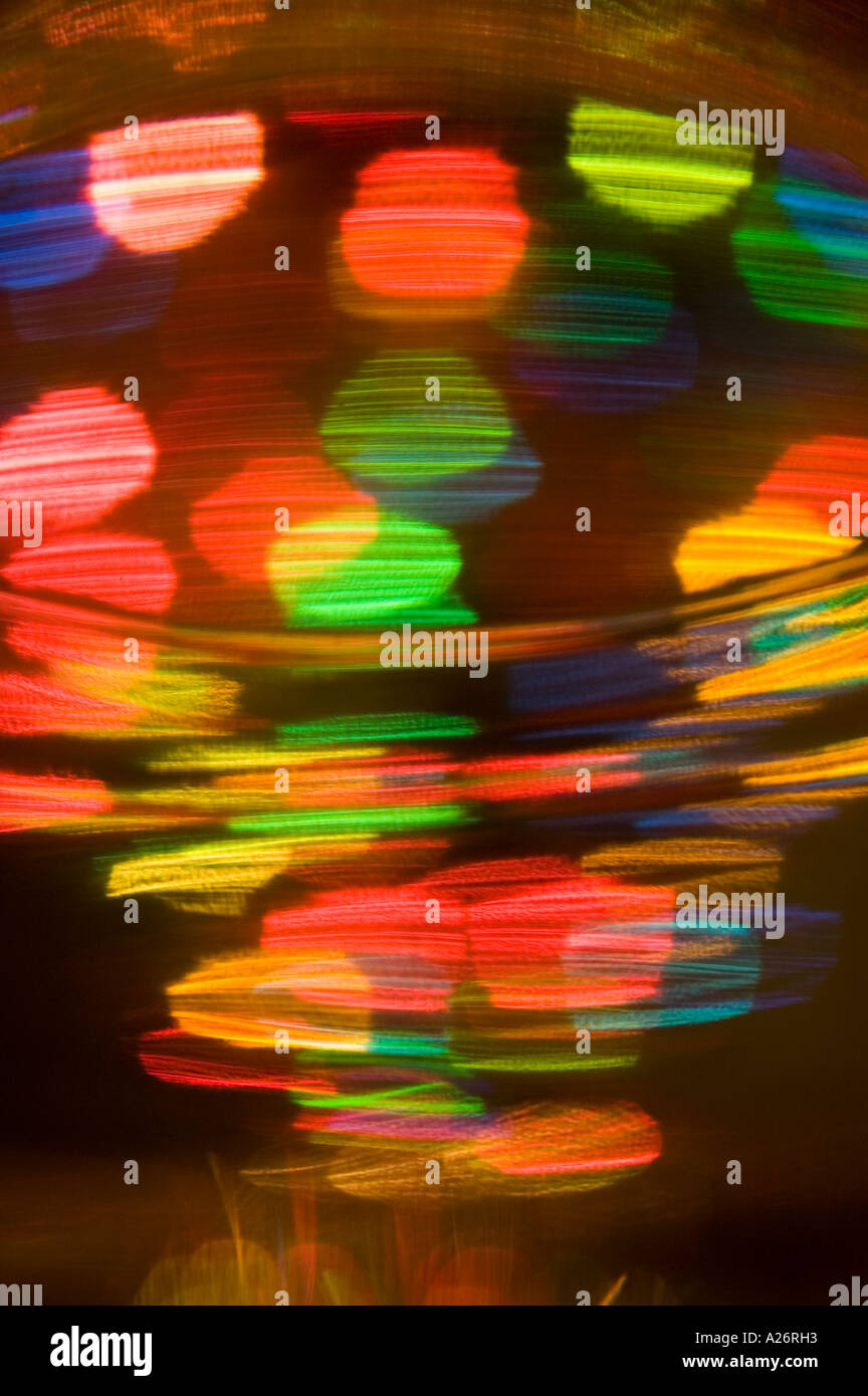 Festive Christmas lights refracted through various glass containers ...