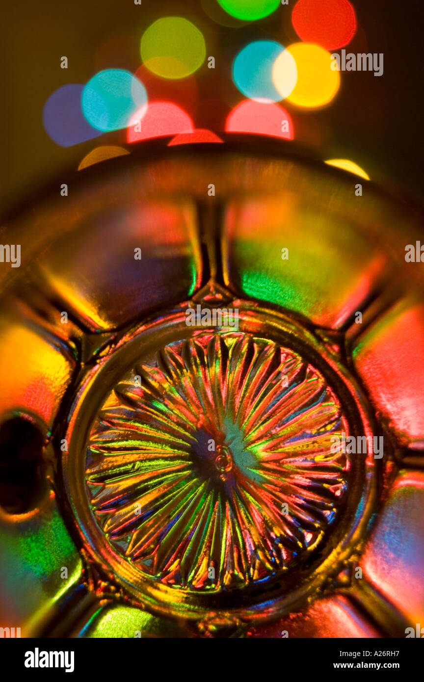 Festive Christmas lights refracted through various glass containers ...
