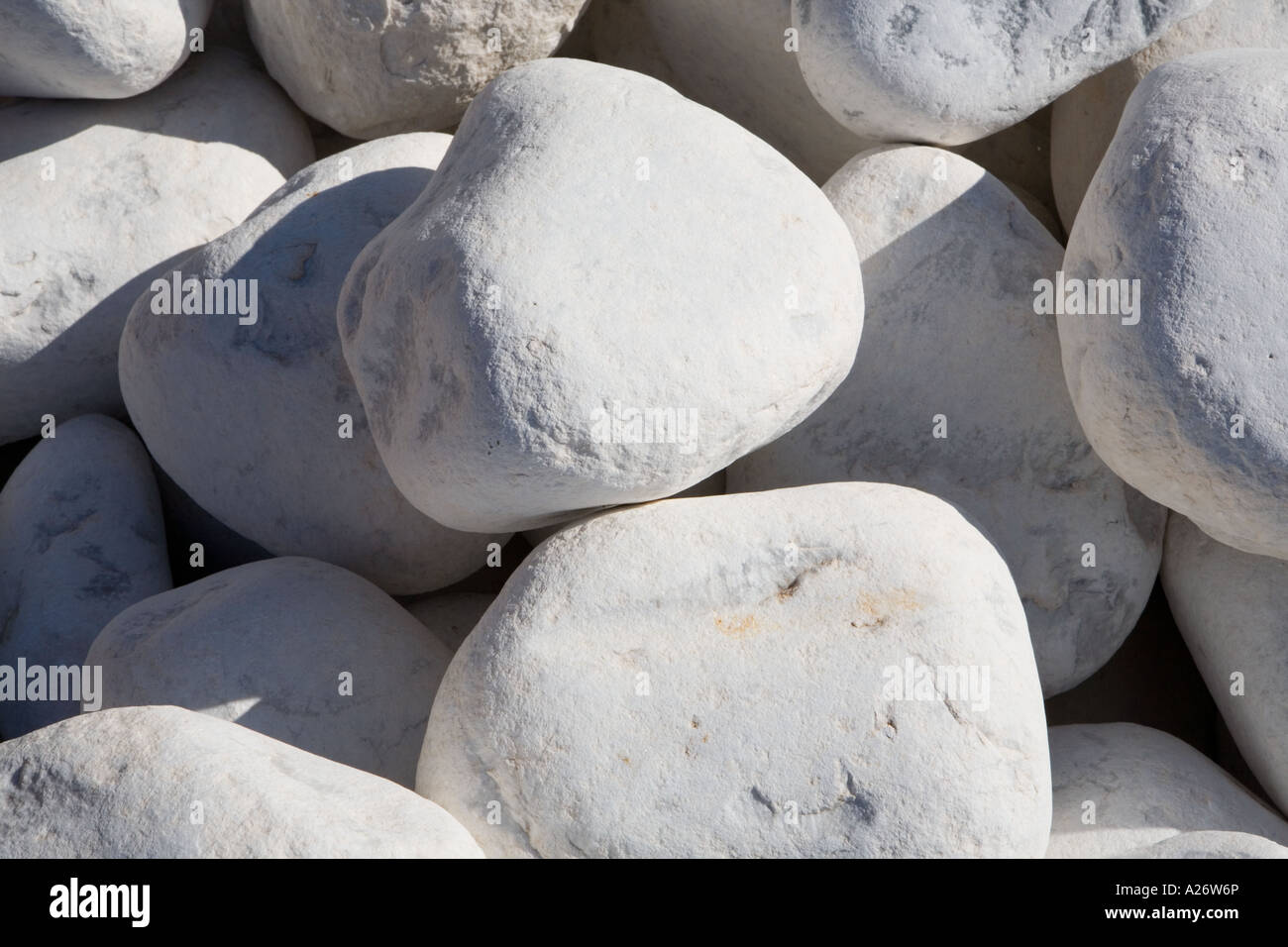 Background texture large smooth grey pebbles Stock Photo - Alamy