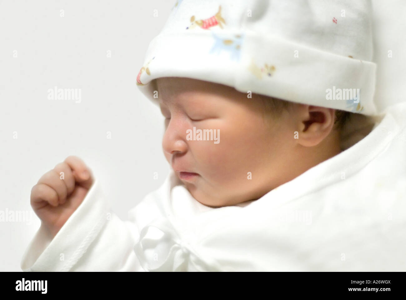 Baby wearing bonnet hi-res stock photography and images - Alamy