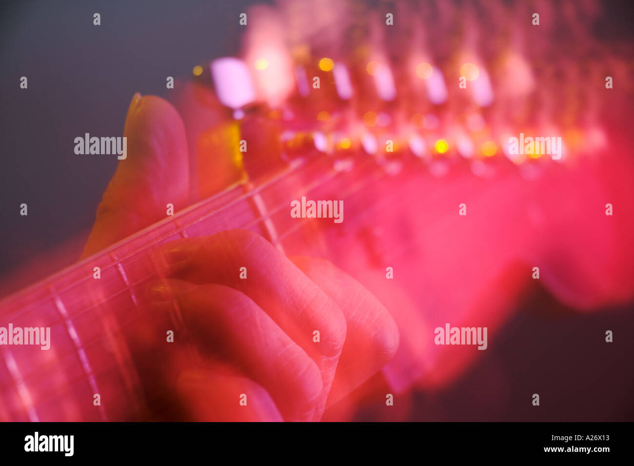 Hands playing a Fender electric guitar Stock Photo - Alamy