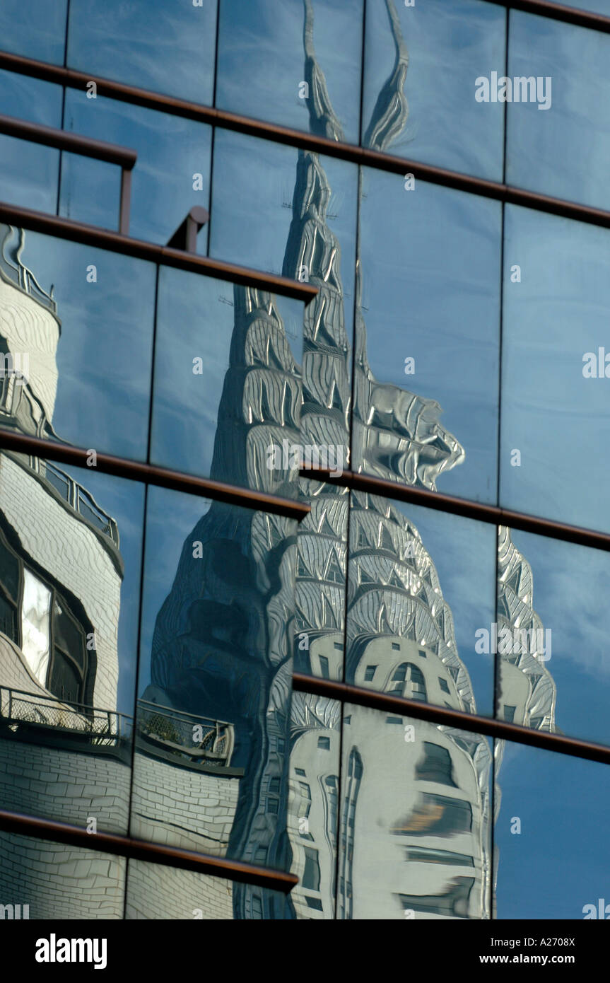 The Chrysler Building skyscraper reflected in the glass of another tall ...