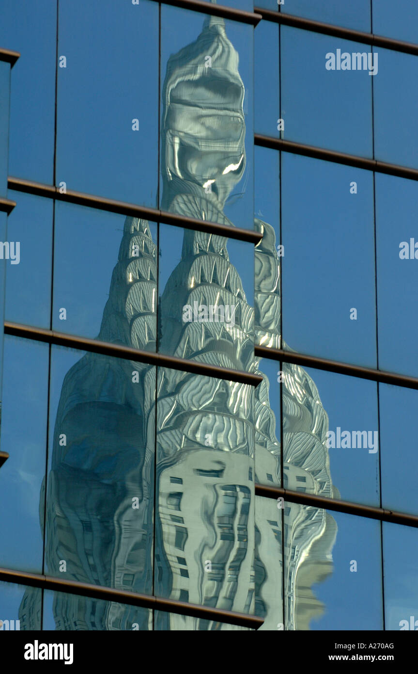 The Chrysler Building skyscraper reflected in the glass of another tall ...