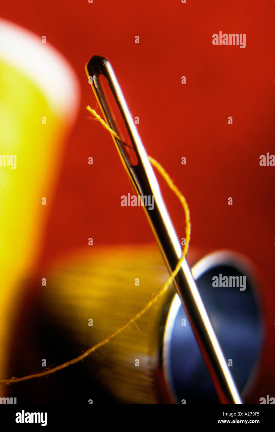 needle thread with thimble Stock Photo - Alamy