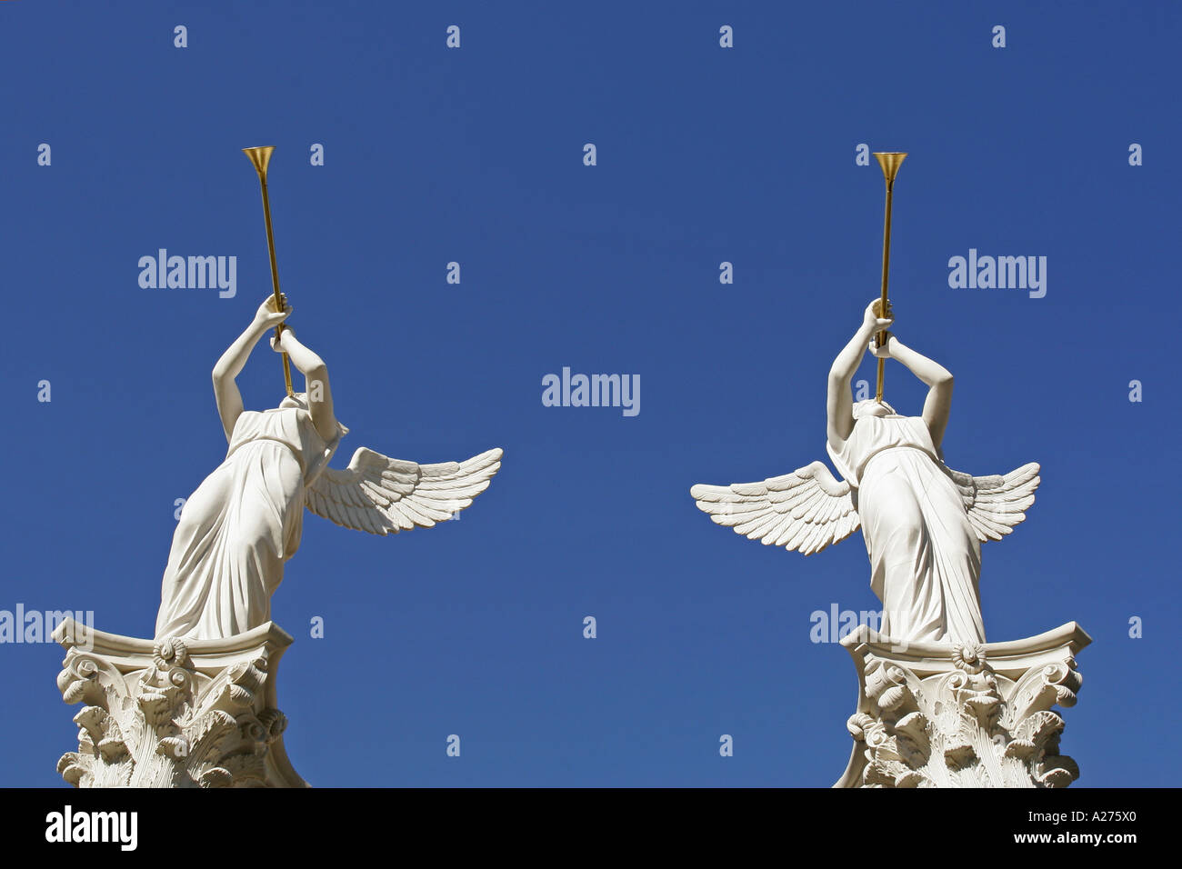 Angel statues with trumpets Stock Photo - Alamy