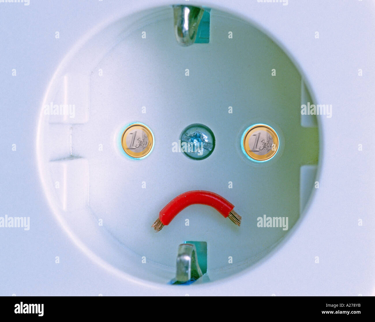 negative energy socket with a sad face and eyes made of euro coins ...