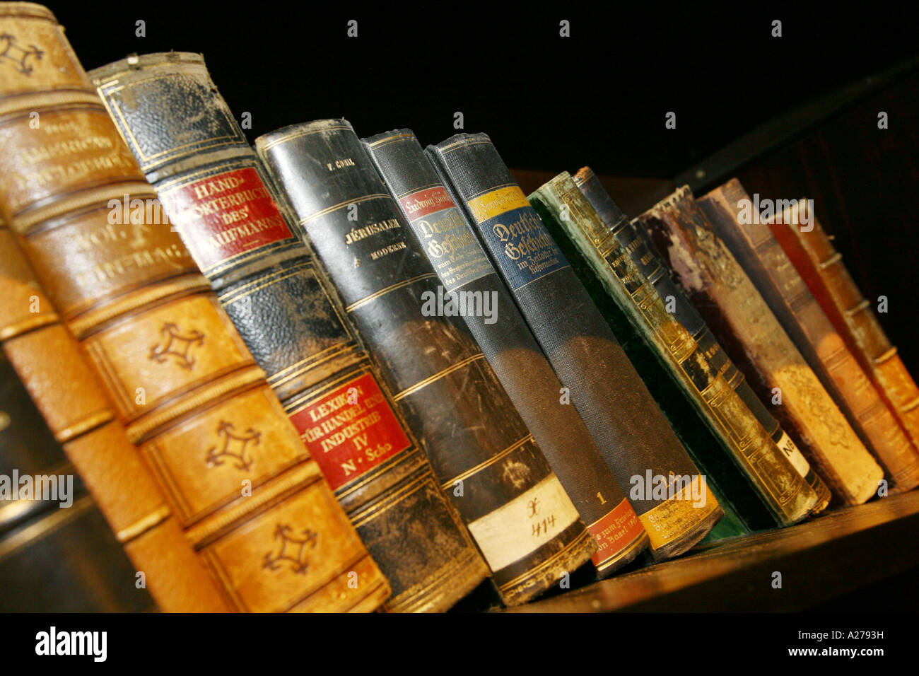 Old books on a shelf Stock Photo - Alamy