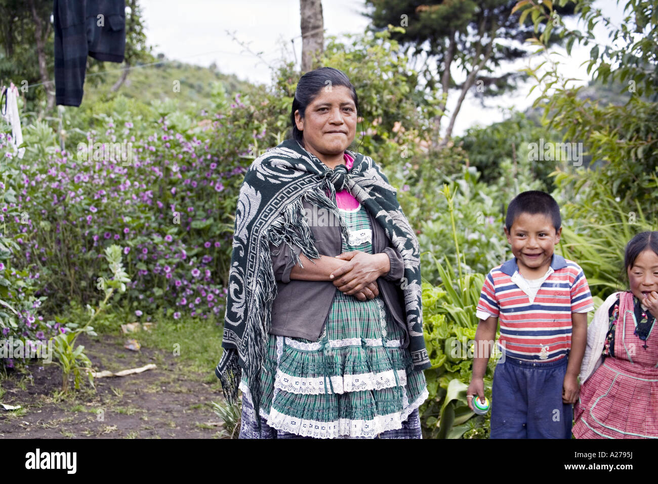 GUATEMALA CAPELLANIA Indigenous Maya Quiche mother in colorful ...
