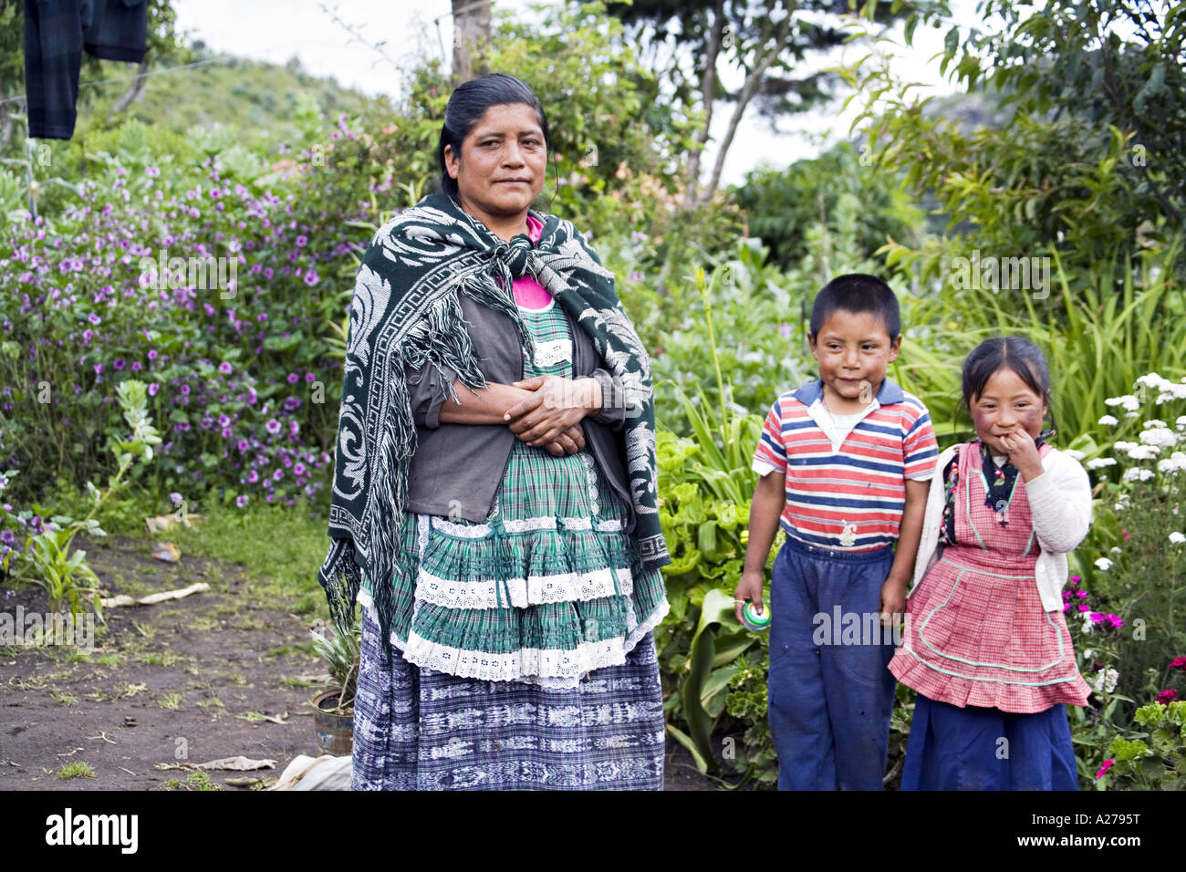 GUATEMALA CAPELLANIA Indigenous Maya Quiche mother in colorful ...