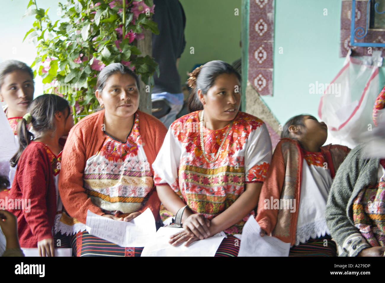 GUATEMALA CAPELLANIA Indigenous Maya Ixil young women in colorful ...