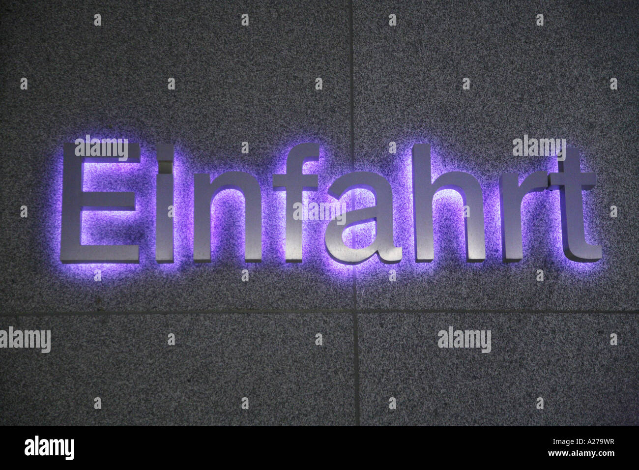 Illuminated sign saying gateway Einfahrt Stock Photo - Alamy