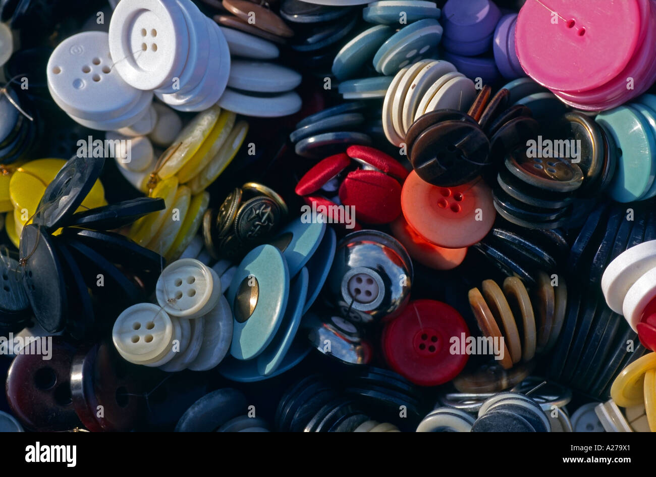 many buttons in differnt colours Stock Photo - Alamy