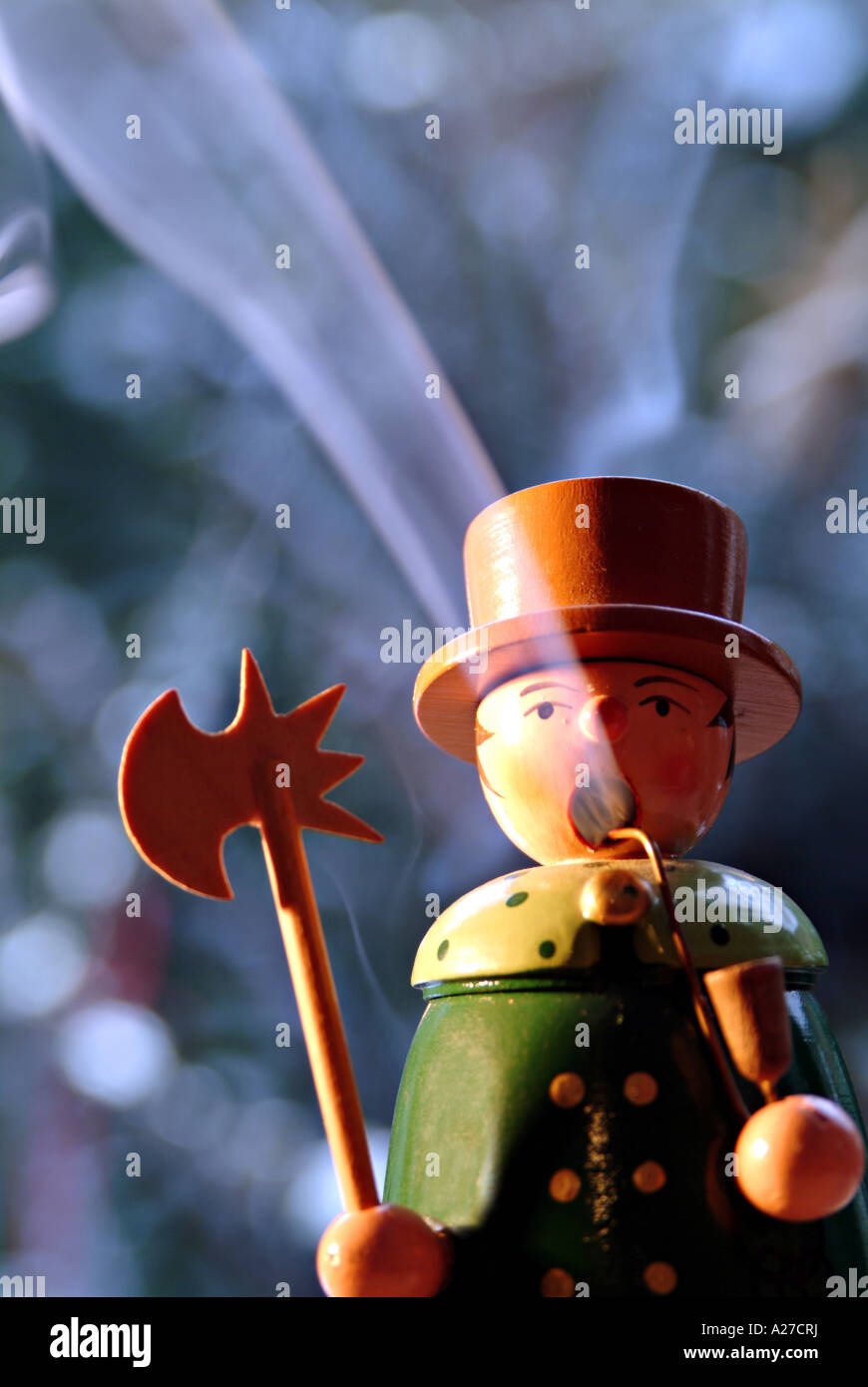 Traditional german Christmas decoration, little smoking man, in front ...
