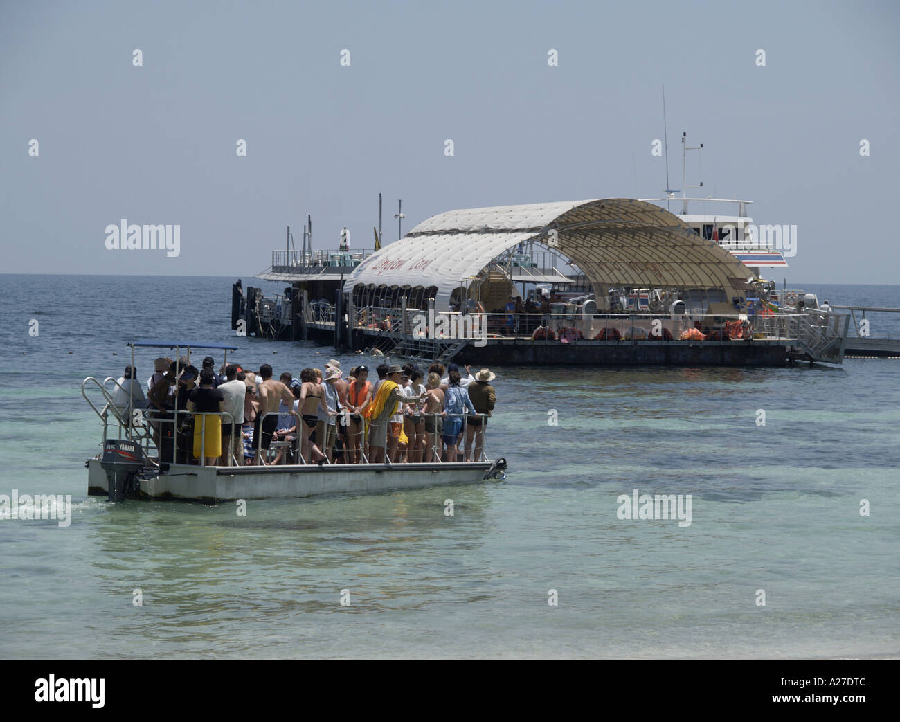 SMALL BOAT RETURNING TO THE COVERED FLOATING PLATFORM PULAU PAYAR ...
