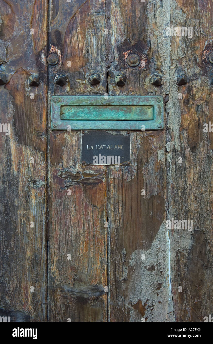 A copper letterbox oxidized green by the sea air on the French Cote d ...