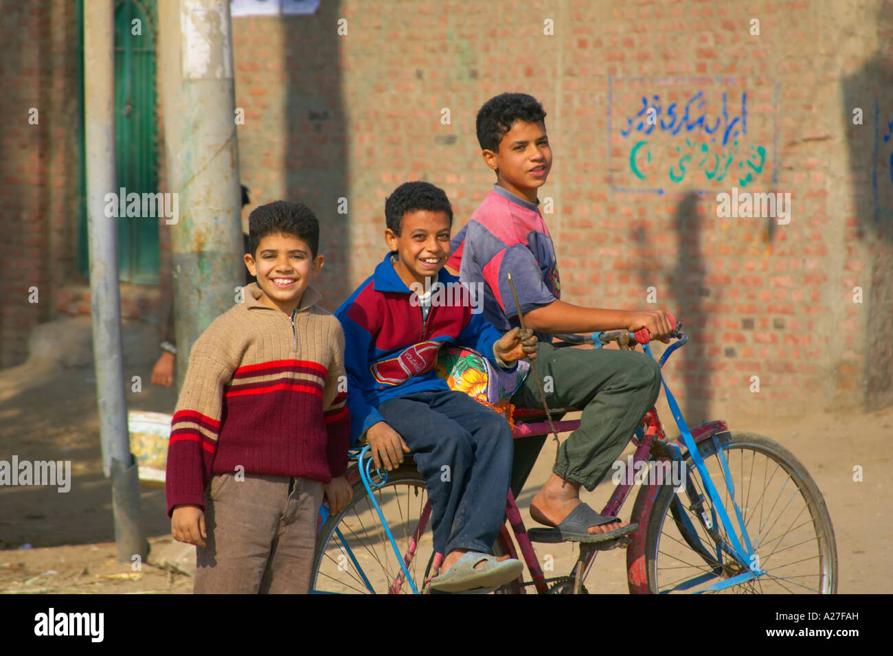 Three Egyptian Boys outdoors in Cairo Egypt Stock Photo - Alamy