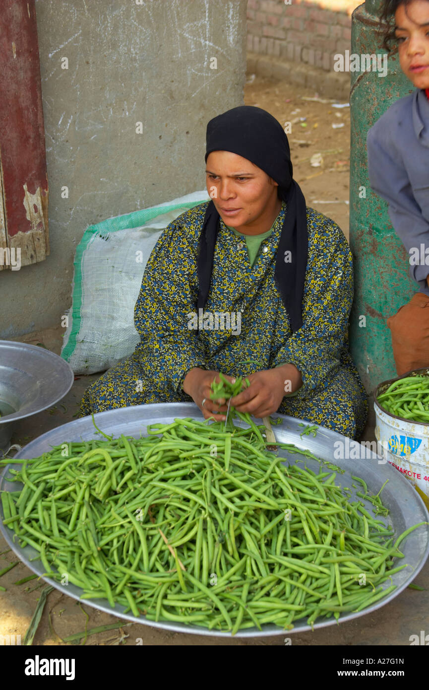 Egyptian Woman Preparing Beans Stock Photo - Alamy