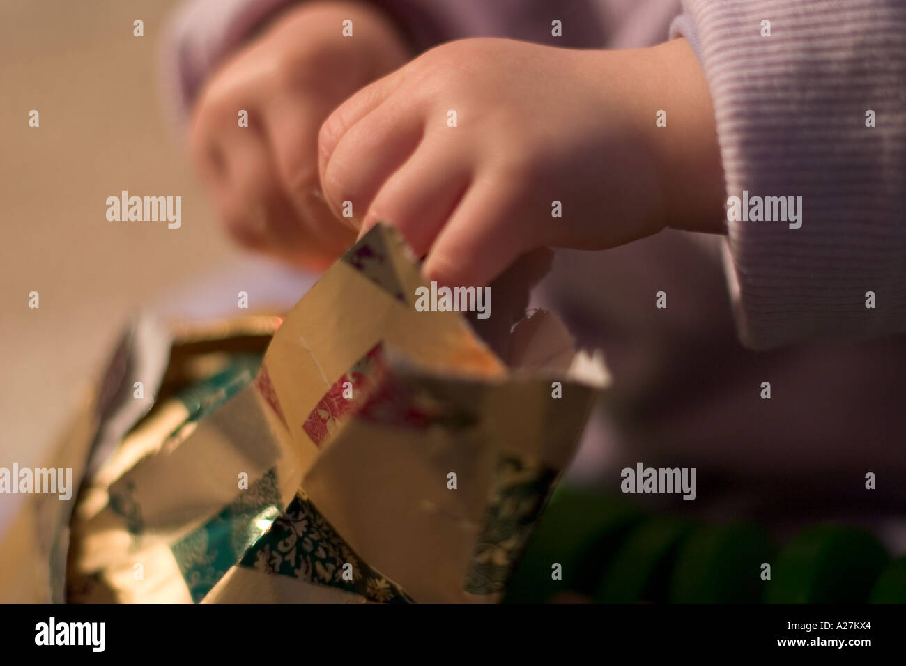 Child tearing paper hi-res stock photography and images - Alamy