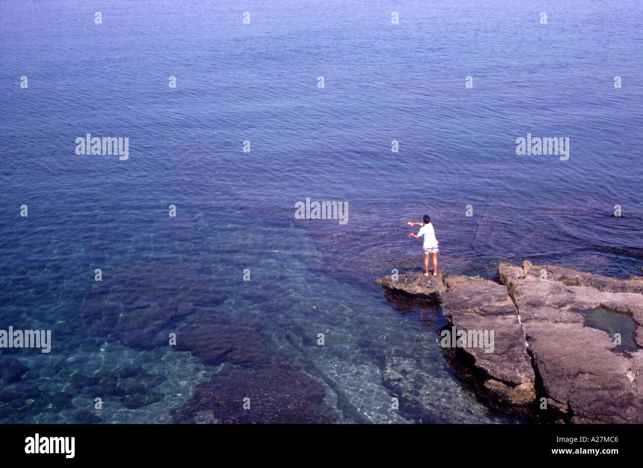 Throwing rocks hi-res stock photography and images - Alamy
