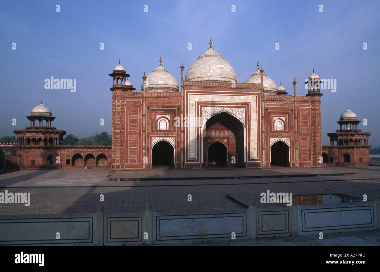Red mosque of the Taj Mahal in Agra India at daybreak dawn Stock Photo ...